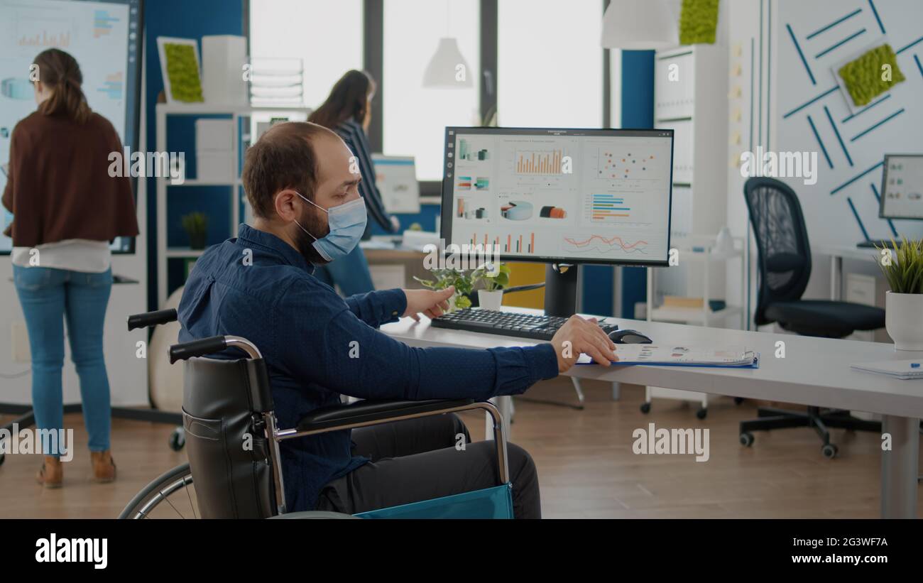 Teamworkers in new normal office hi-res stock photography and images ...