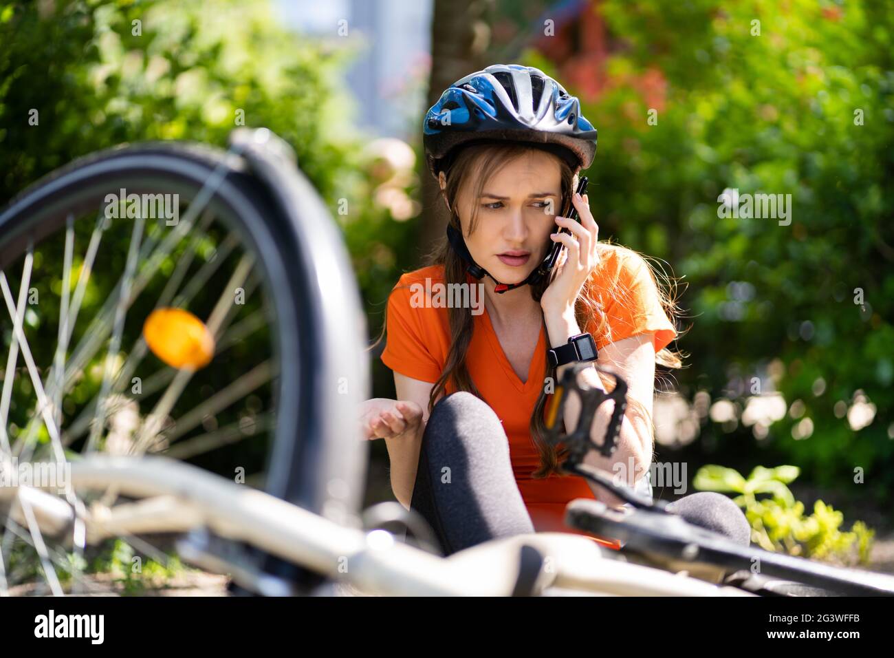 Cyclist Fell Down From Bike. Bicycle Injury Stock Photo - Alamy