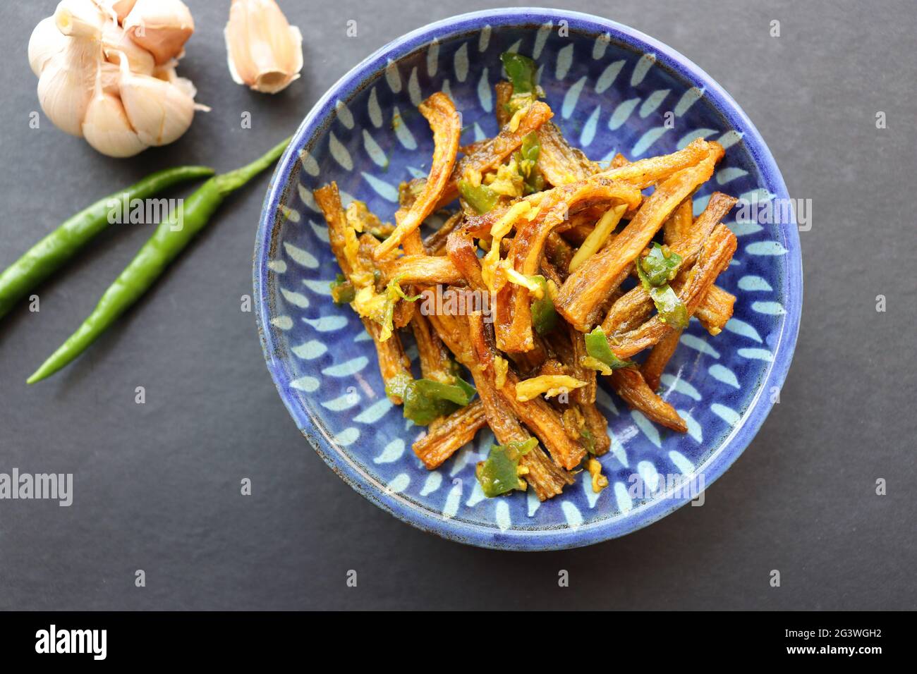 Dry Bombay duck fried with chili and garlic. Dried Bombay duck masala ...