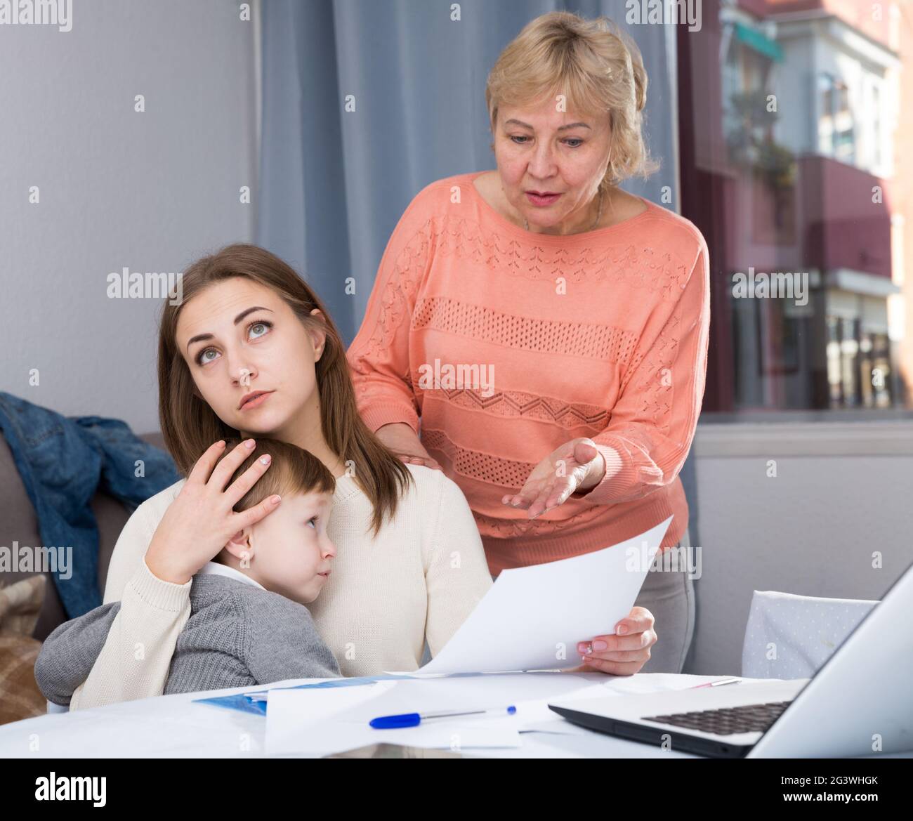 Outraged female are having disagreements with her mother for problems ...