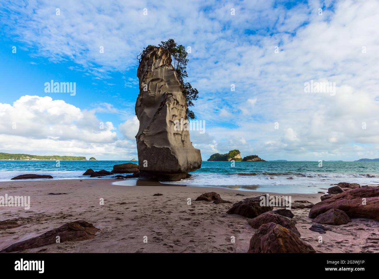 Grass and trees grow on huge rocks Stock Photo - Alamy