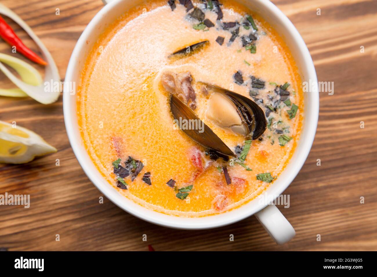 Hot fish broth, seafood. Soup with mussels and fish. Concept - a menu ...