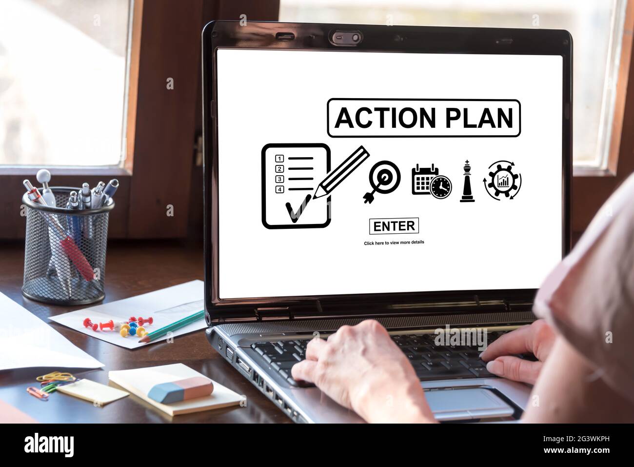 Laptop screen displaying an action plan concept Stock Photo - Alamy