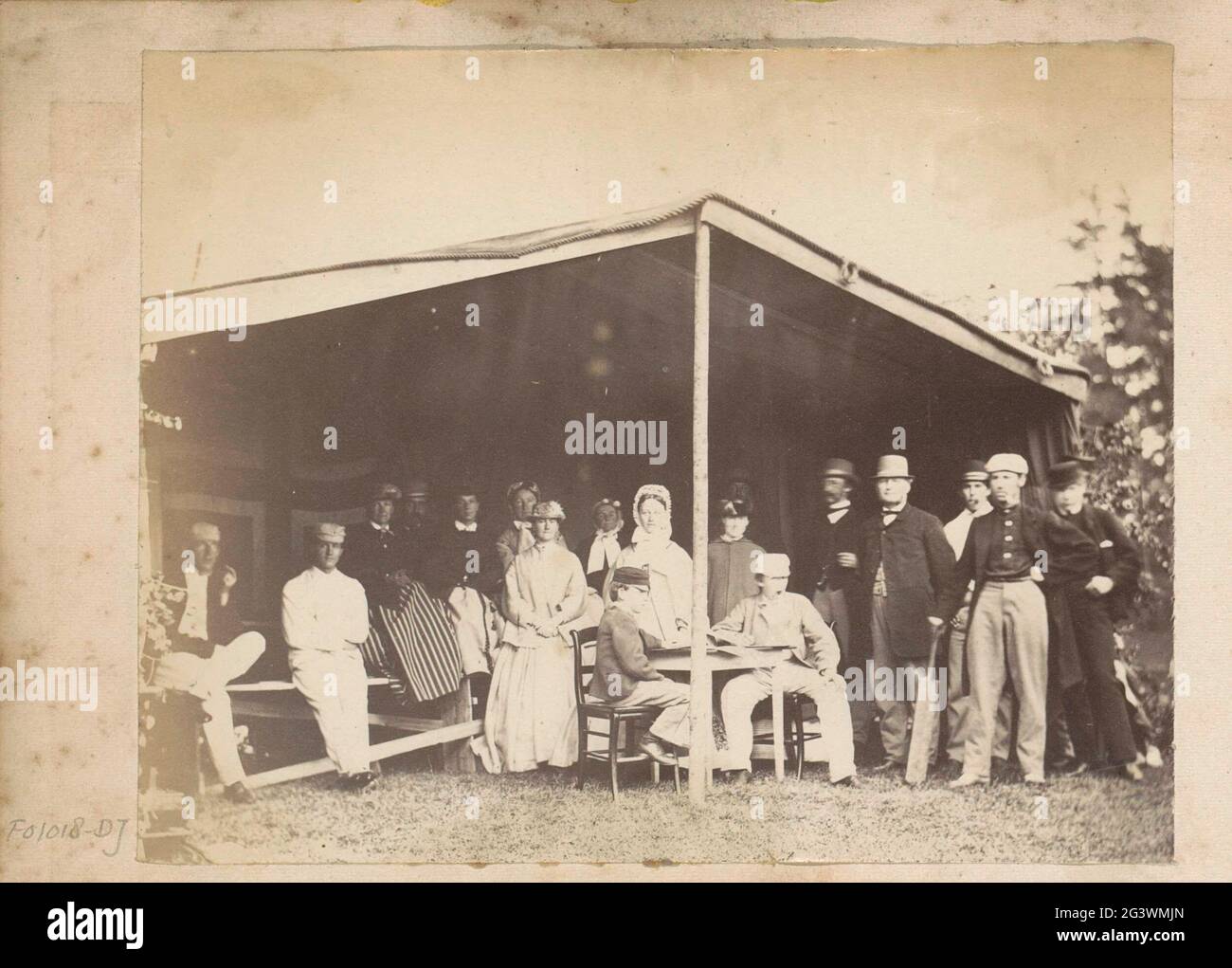 Group portrait of cricket players in a tent in Christiania; Cricket ...