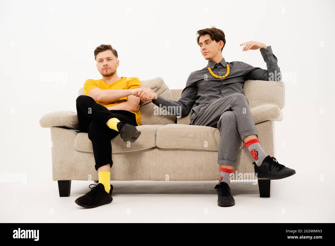 Two male friends in house hi-res stock photography and images - Alamy