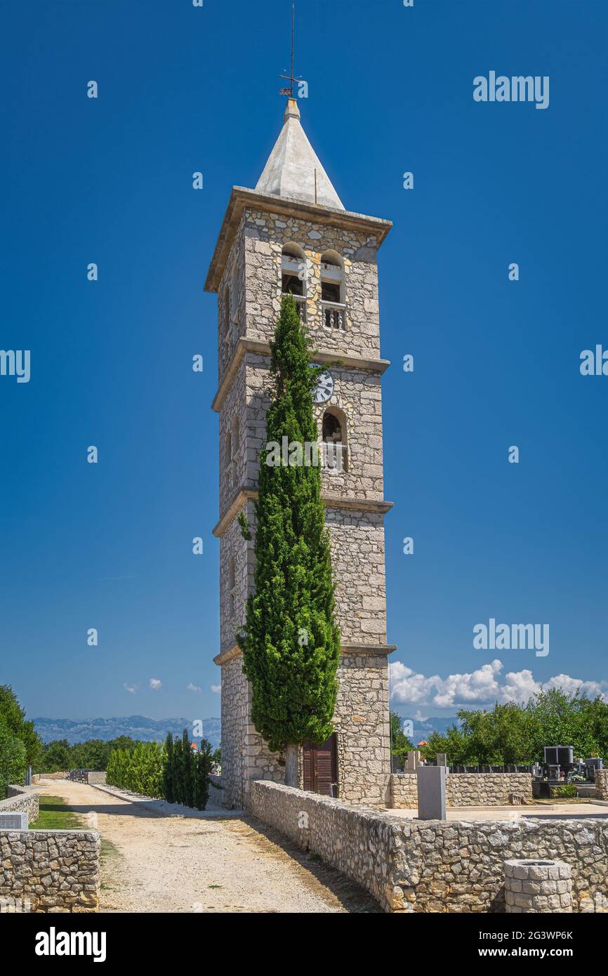 Bell and clock tower of a Church of the Nativity of the Blessed Virgin ...