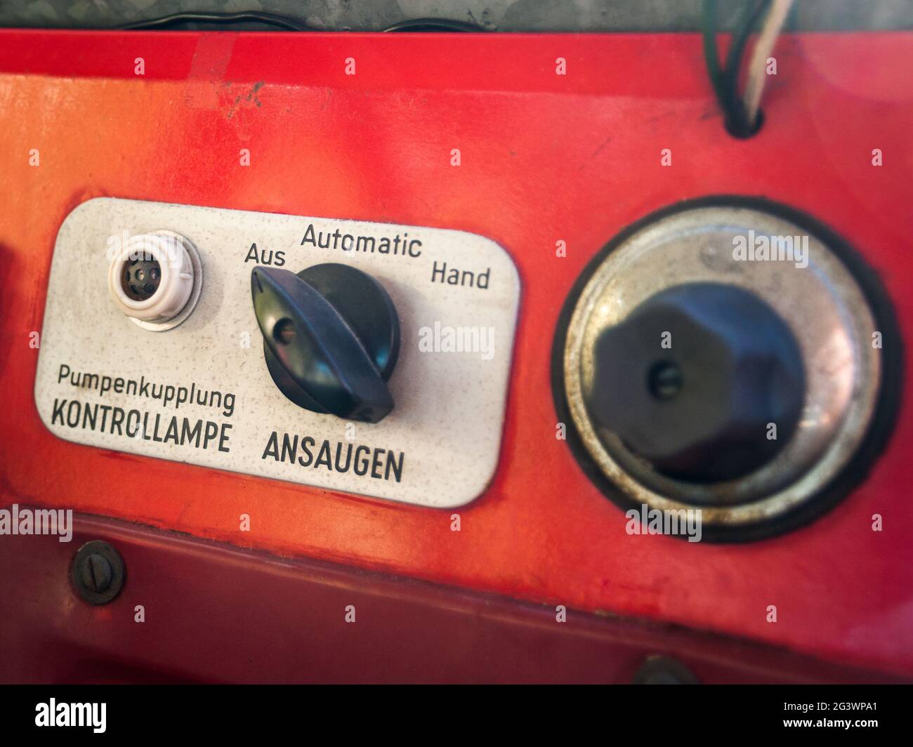 Instruments in german at the panel of an old off-road vehicle in color ...