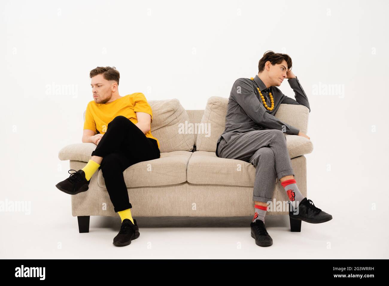 Two opposite sports fans watching hi-res stock photography and images ...