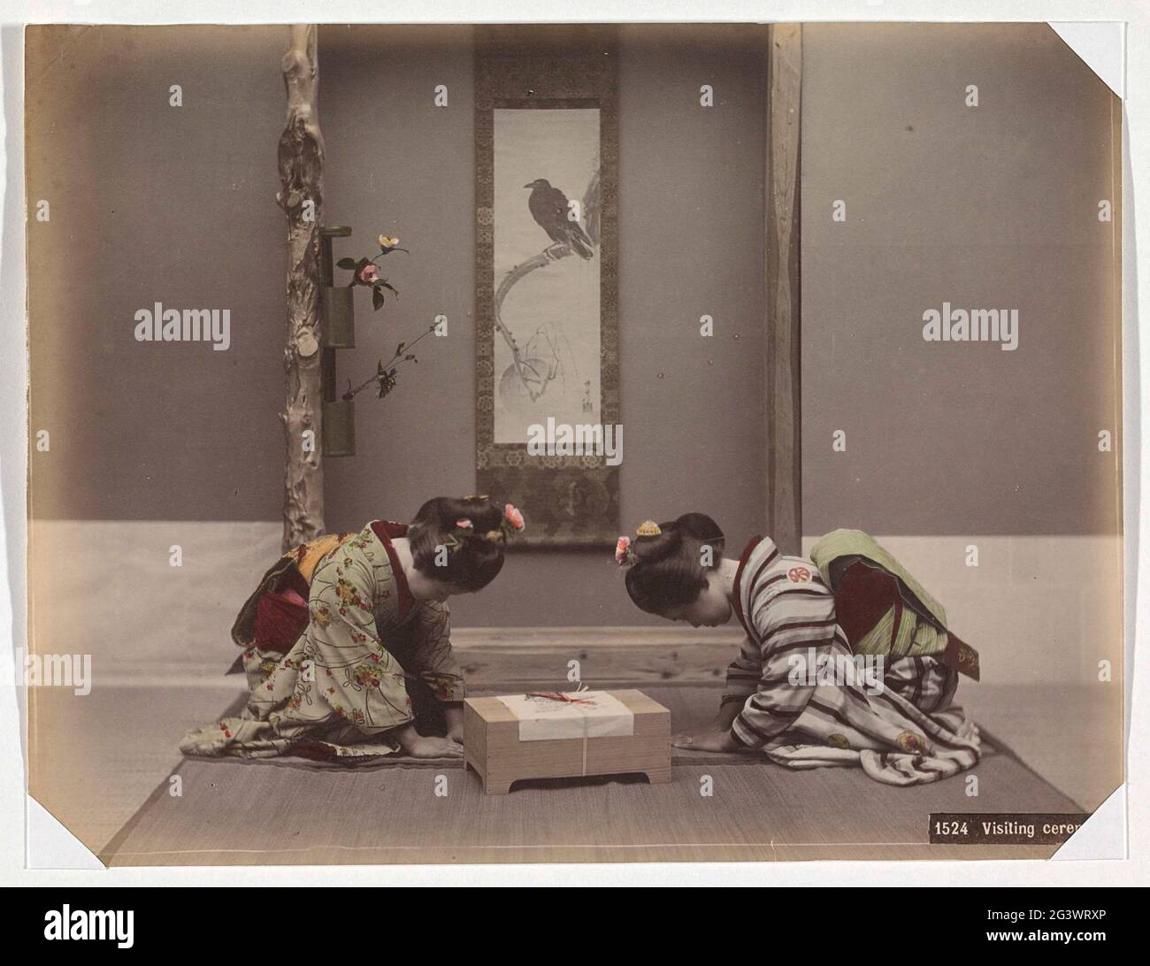 Greeting ritual of two Japanese women; Visiting Ceremony. Part of album ...