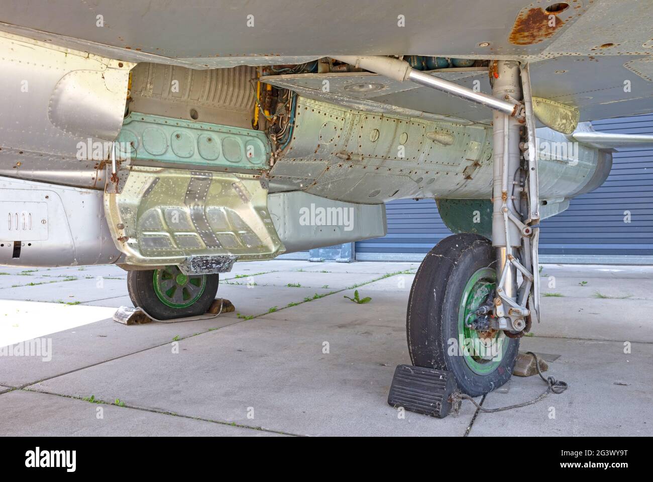 Old black flat wheel of an fighter jet, selective focus Stock Photo - Alamy