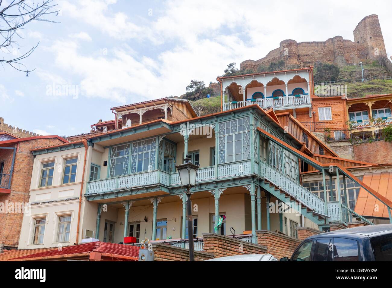 Traditional Georgian houses in Tbilisi at foot of Narikala fortress ...