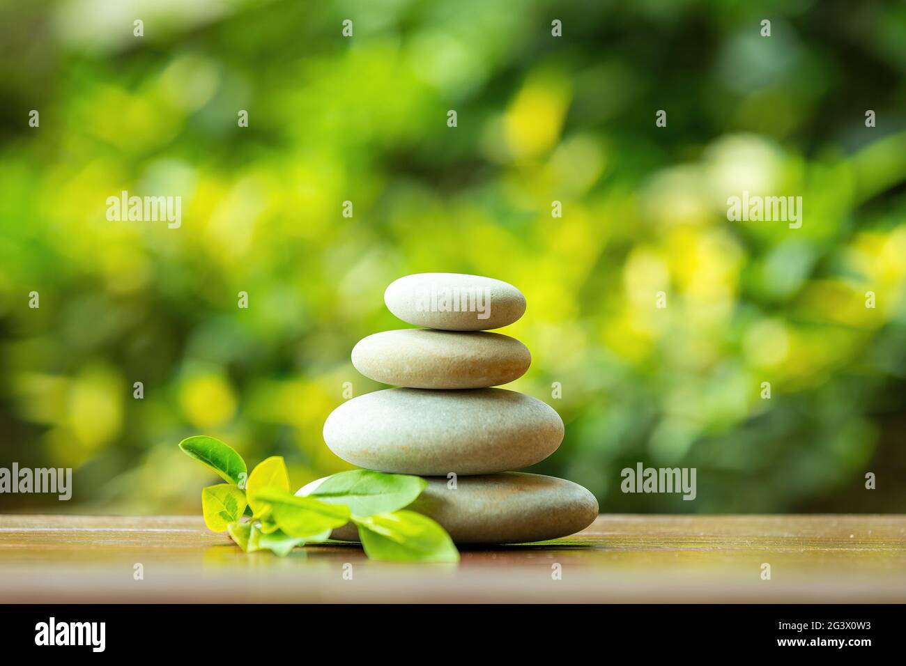 Balancing pile of pebble stones, like ZEN stone Stock Photo - Alamy