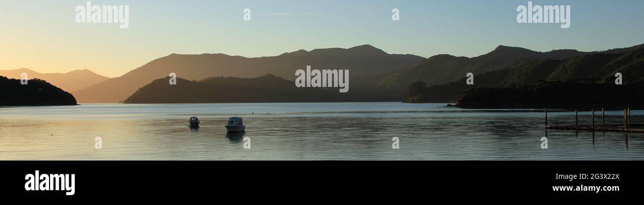 Summer evening in Portage bay, New Zealand Stock Photo - Alamy