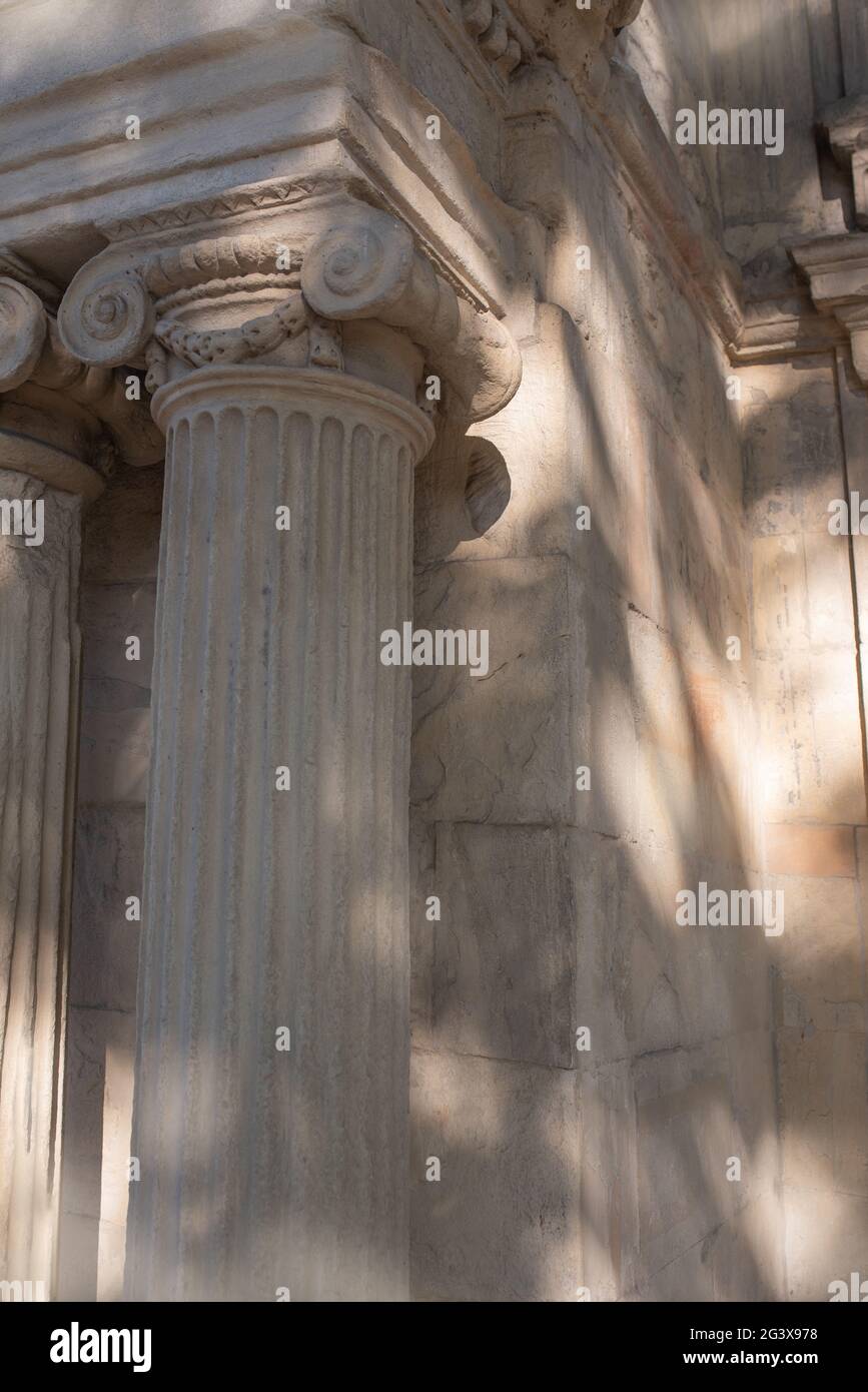 Architecture, old greek temple style. Vertical view Stock Photo - Alamy