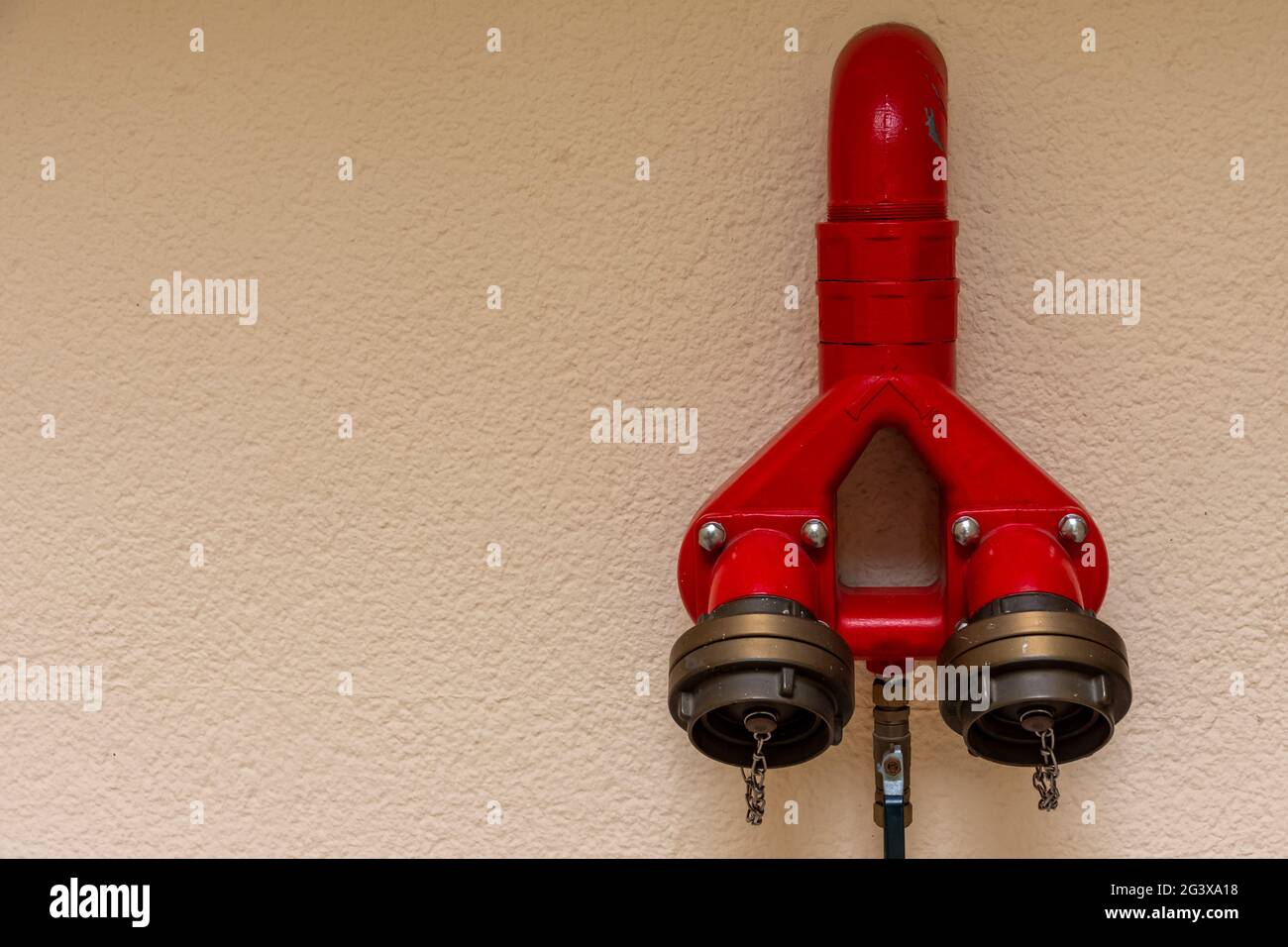 Closeup of a water connection on a house wall for the fire brigade ...
