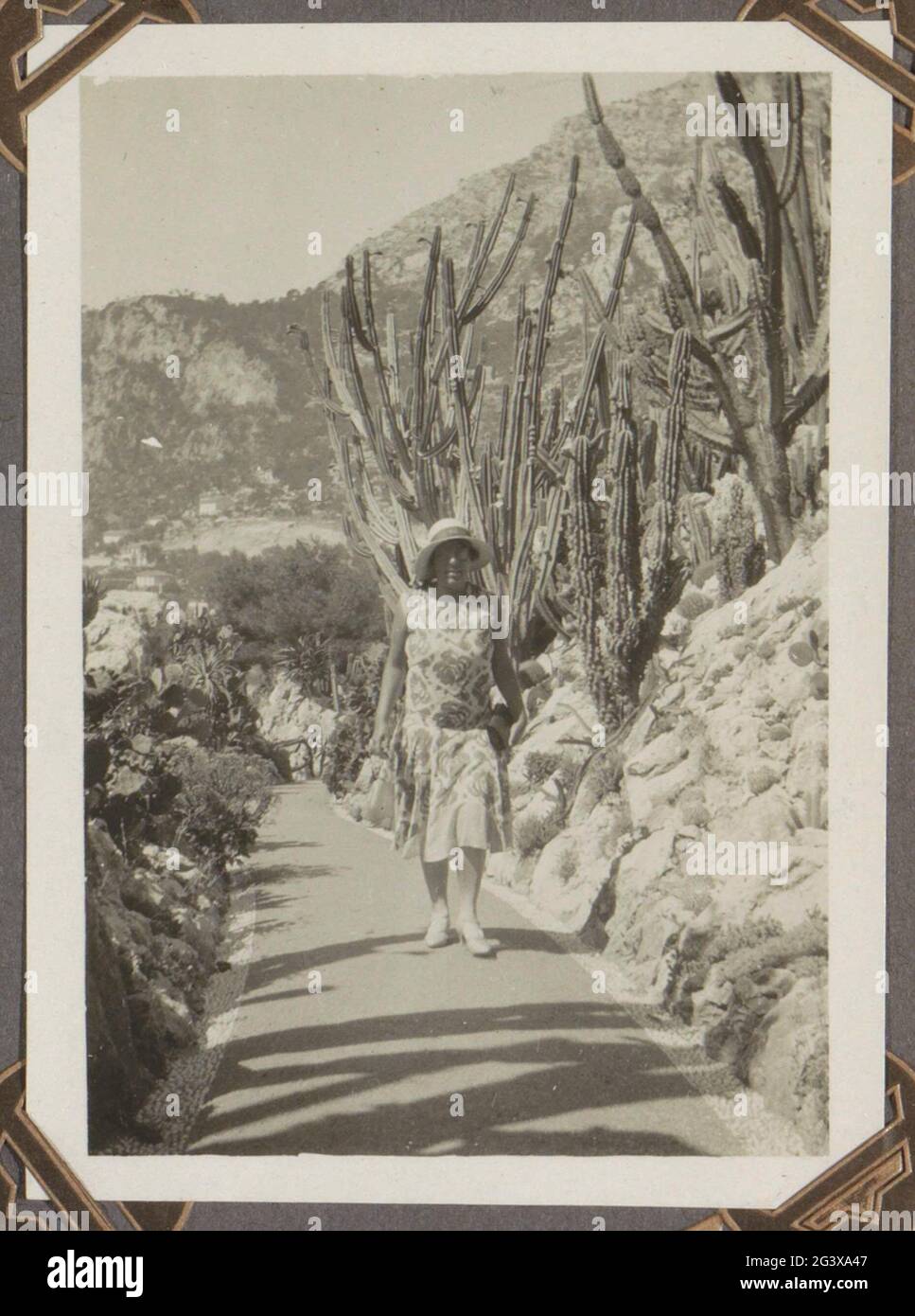Women walking through the Cactus garden of Monte-Carlo. Part of photo ...