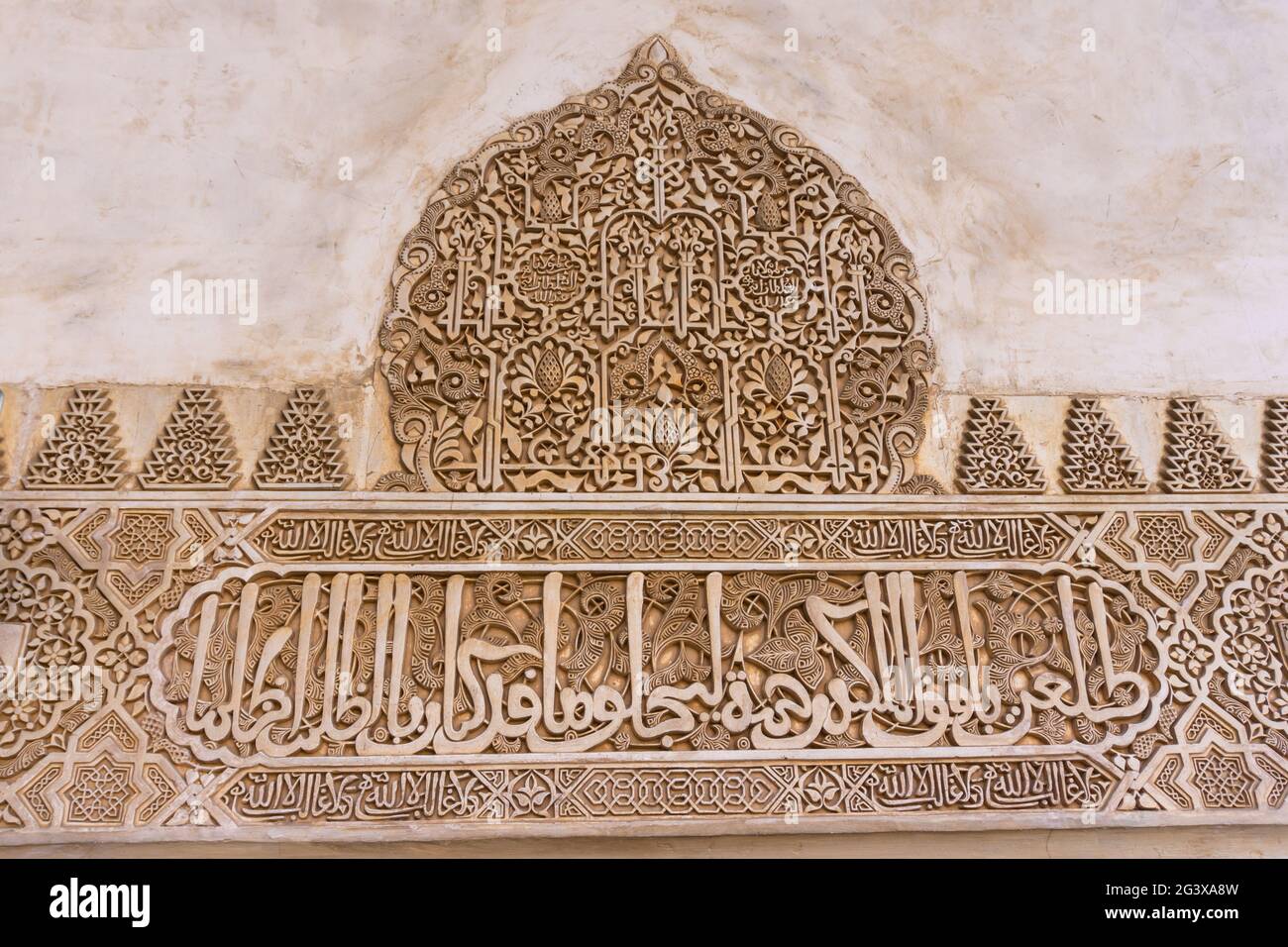 Close up view of detailed carving and Arabic calligraphy work in the ...
