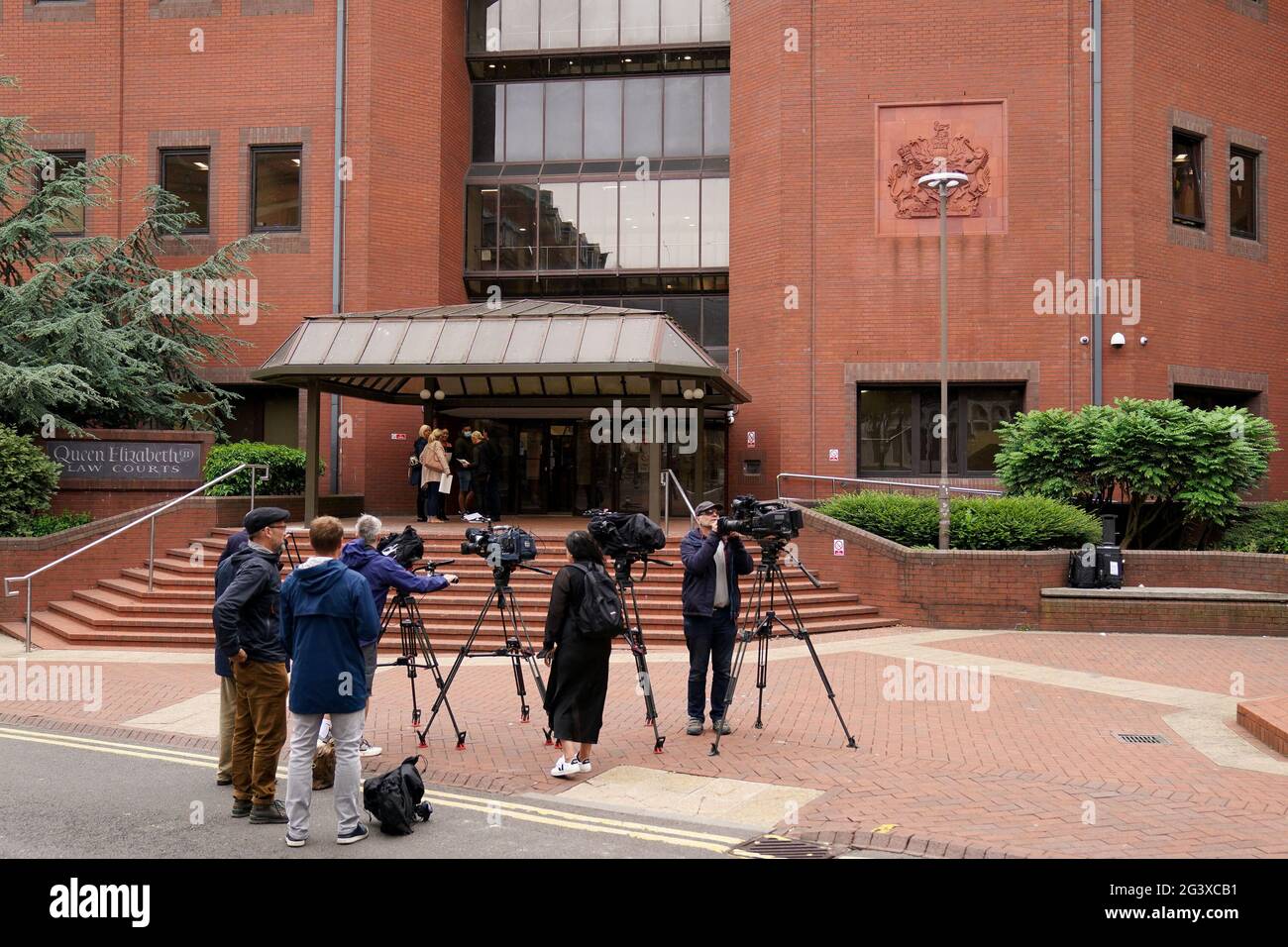 Media gather outside Birmingham Crown Court this morning, where West ...