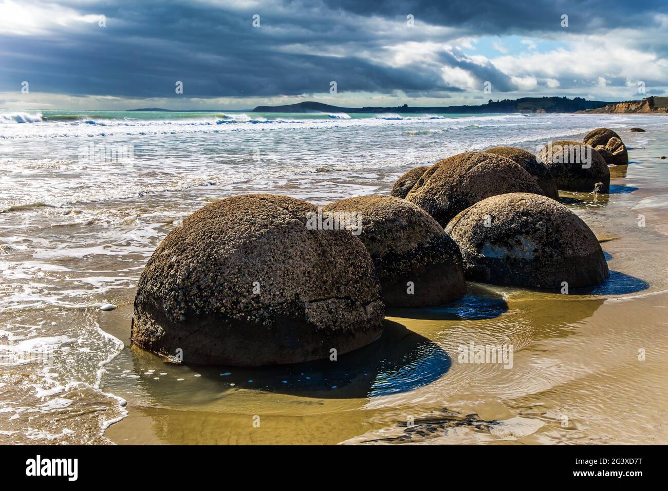 Row of huge round boulders Stock Photo - Alamy