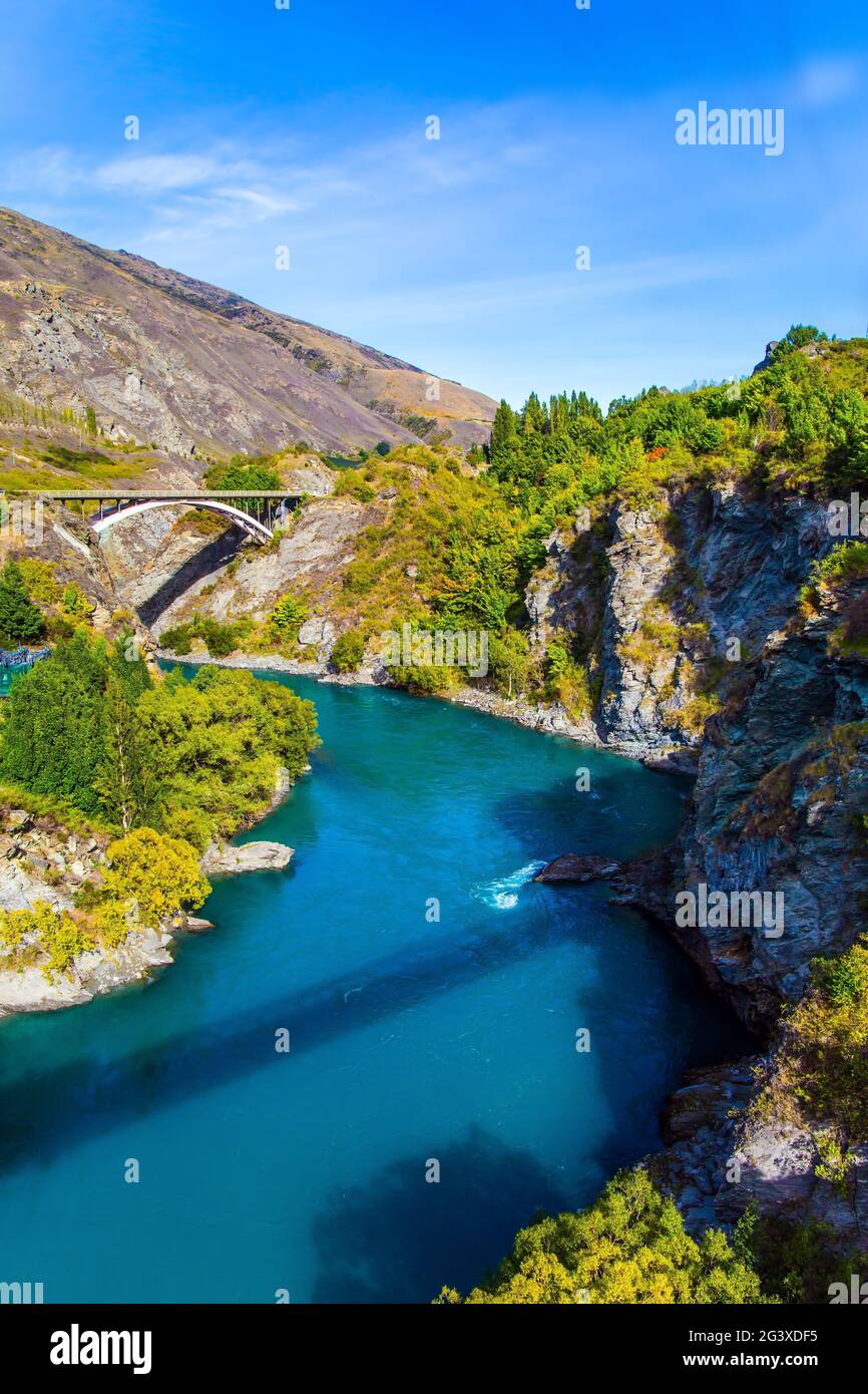 The water in the river is bright green Stock Photo - Alamy