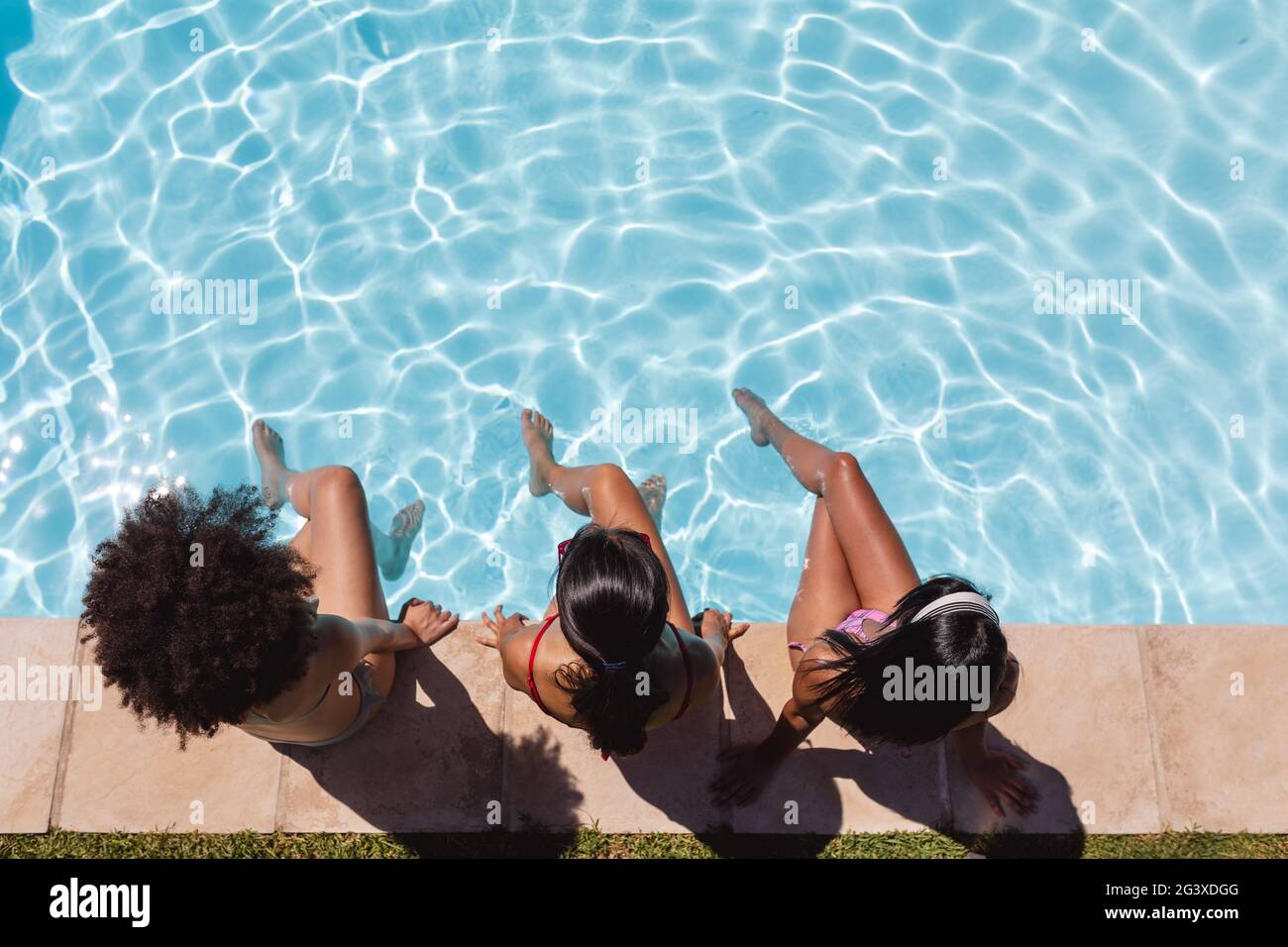 Three young friends relaxing swimming hi-res stock photography and ...