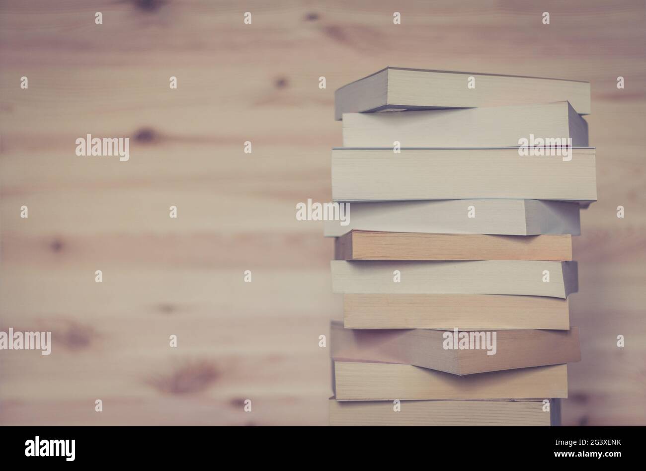 Knowledge and science concept: Stack of books, wooden background Stock ...