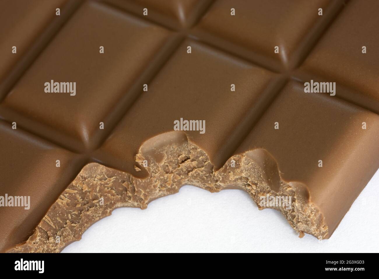 Bite chocolate bar Stock Photo - Alamy