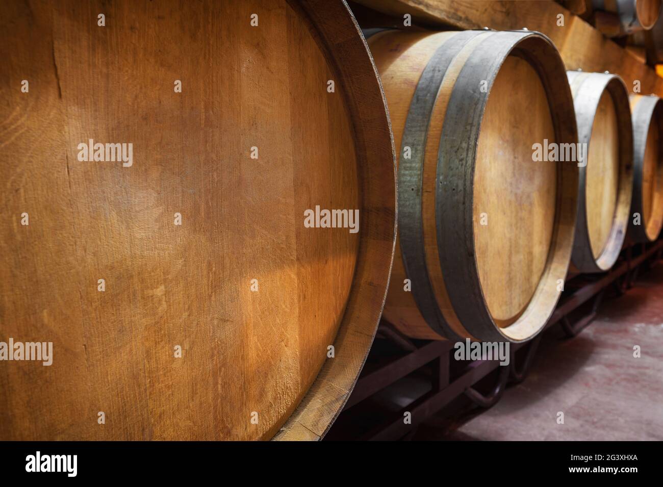 Cellar with barrels of wine Stock Photo - Alamy