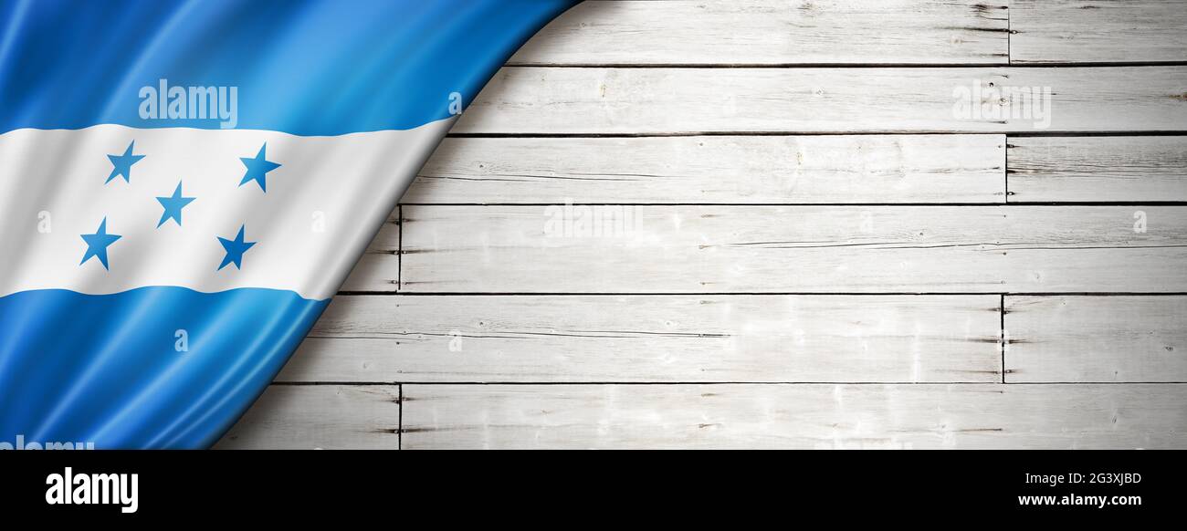 Honduras flag on old white wall banner Stock Photo - Alamy