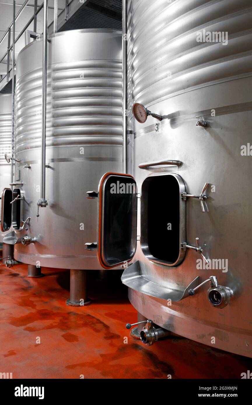 Industrial stainless steel vats in modern brewery Stock Photo - Alamy