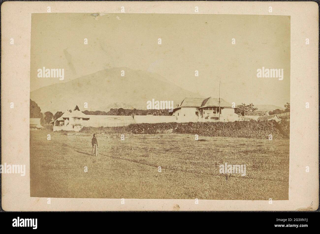 View of the Ternate Sultan home with the Gunung Gamalama in the ...