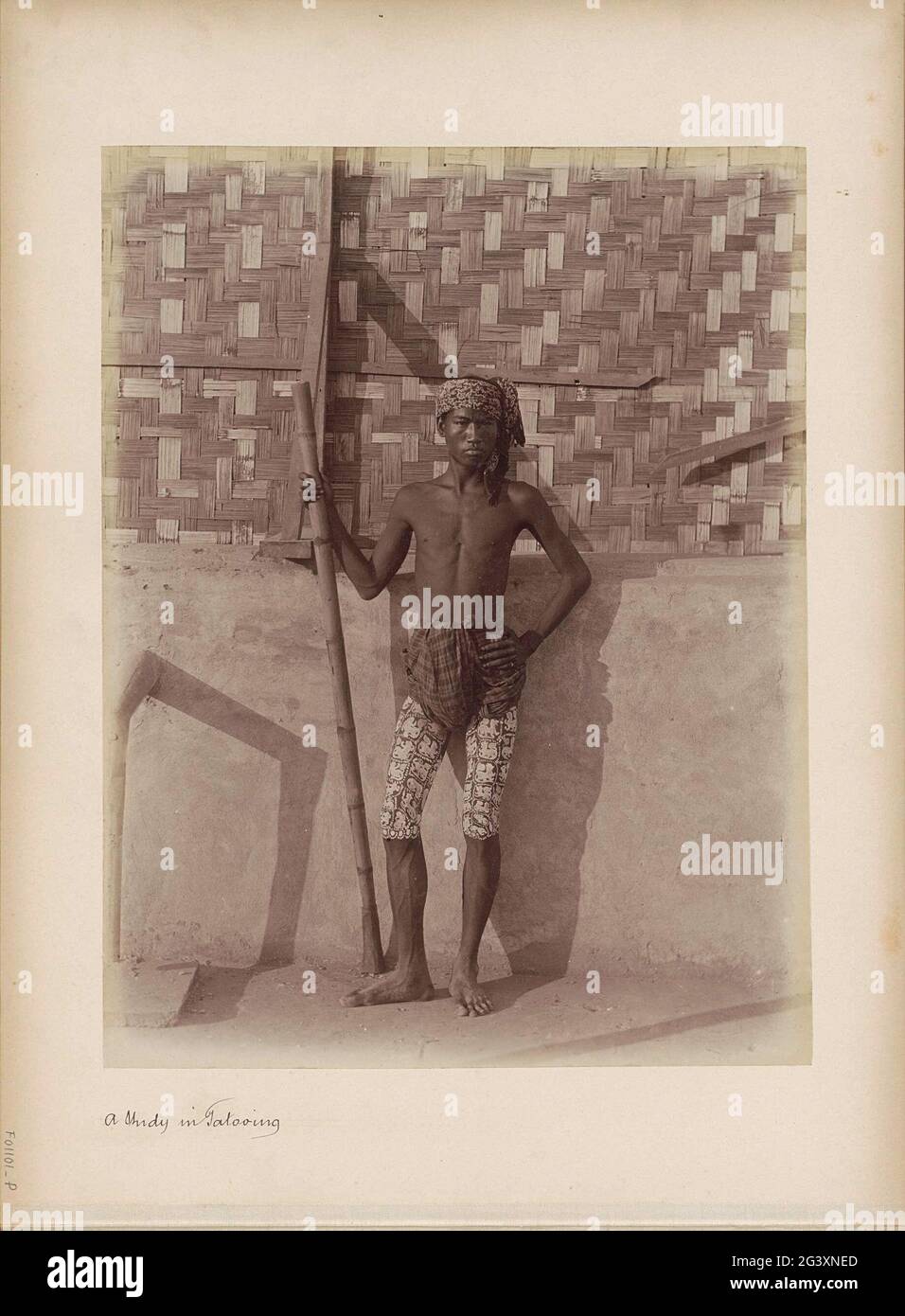 Portrait of a Burmese boy with tattooed or painted upper legs; A Study ...