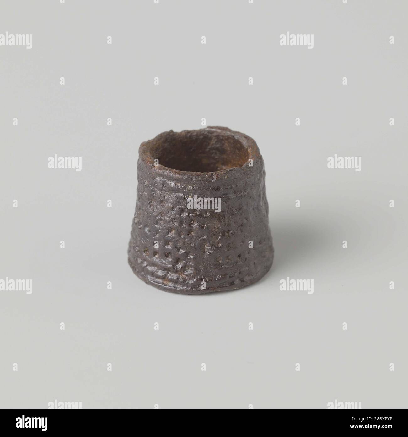 Ring, conical shape, with a punctured relief with annular boundaries ...