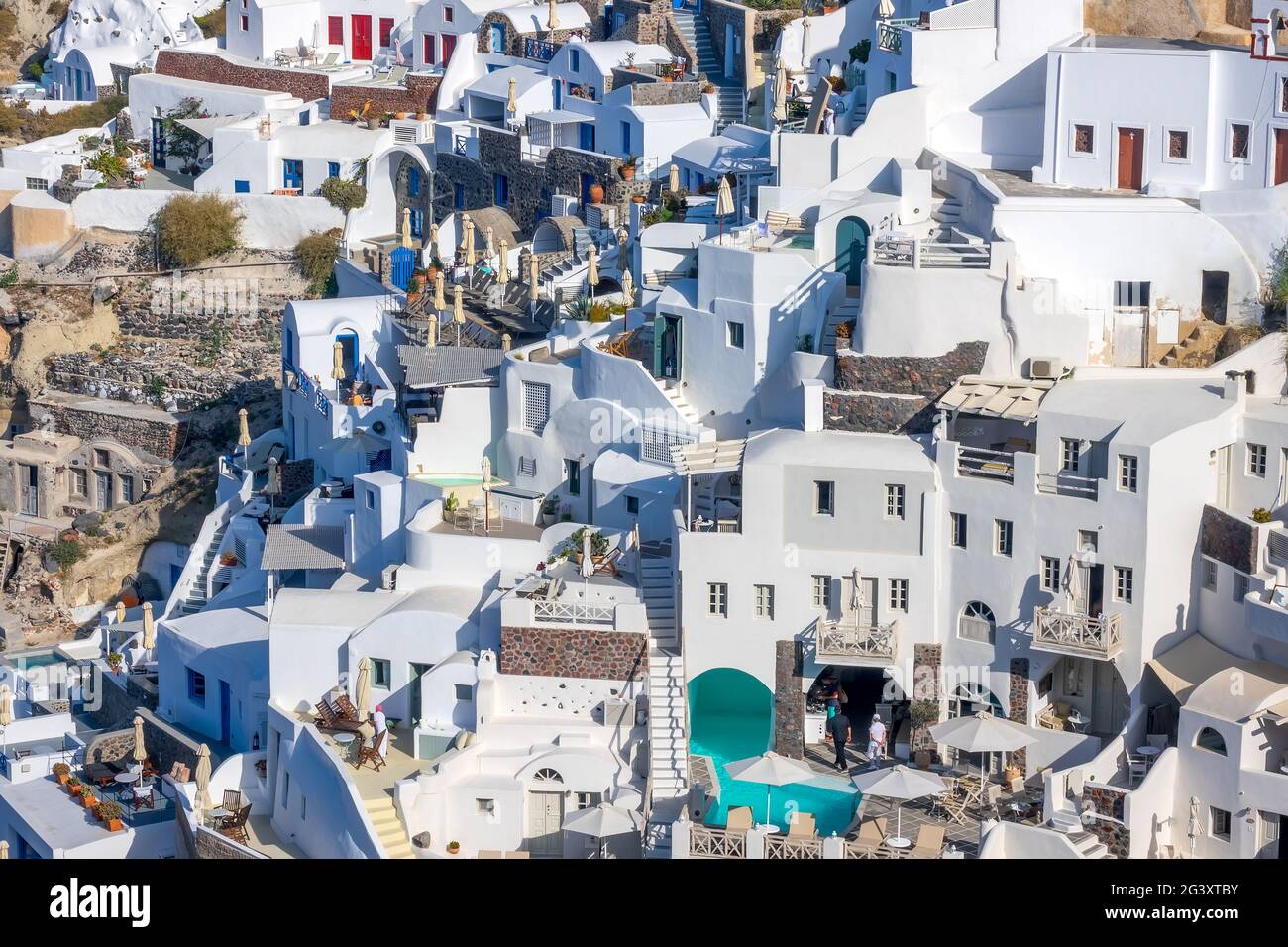 Colorful Buildings on the Rocky Caldera of Santorini Stock Photo - Alamy