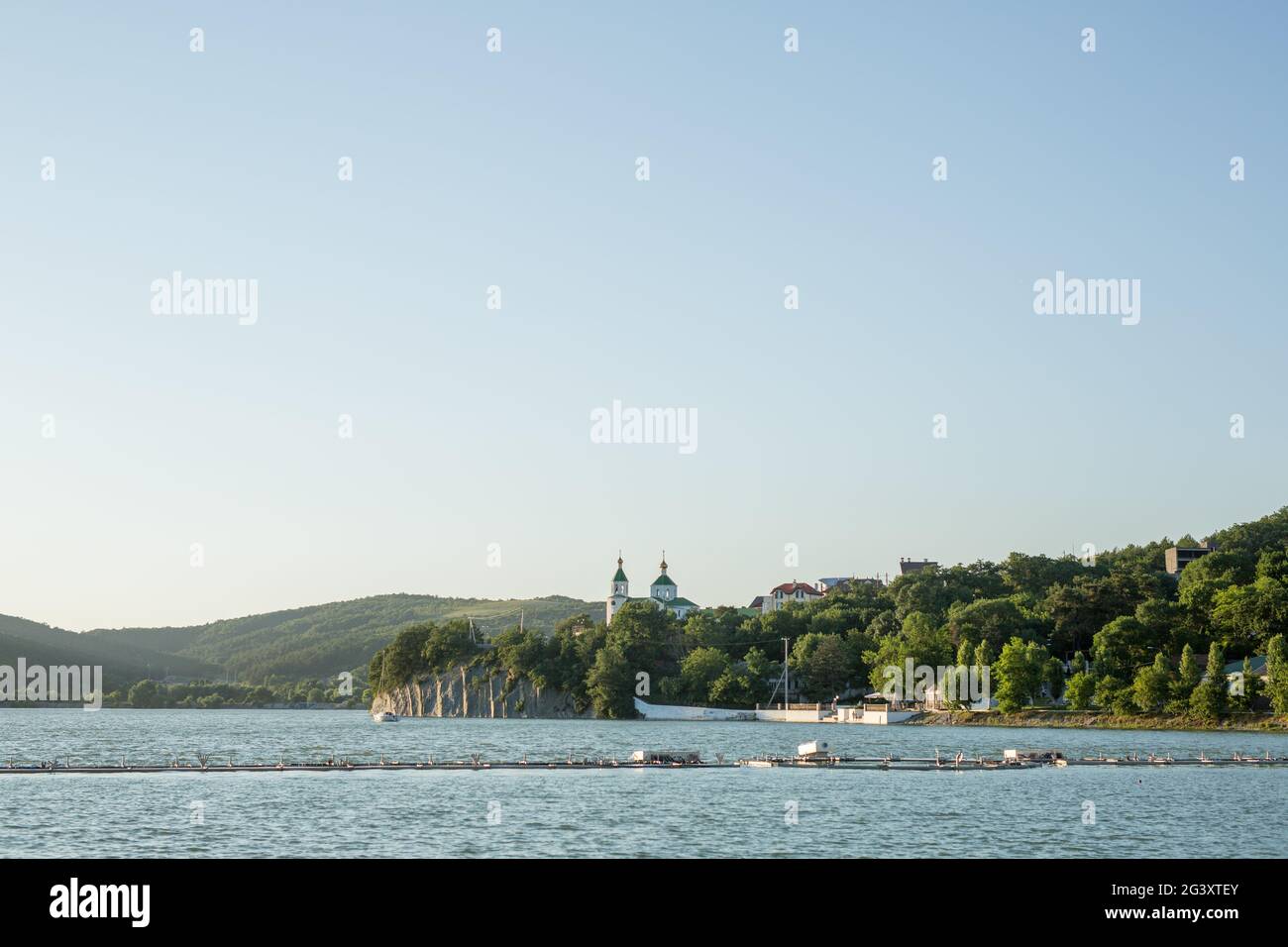Calm sunset at seaside, calm at sea. Clouds over water surface. Concept ...