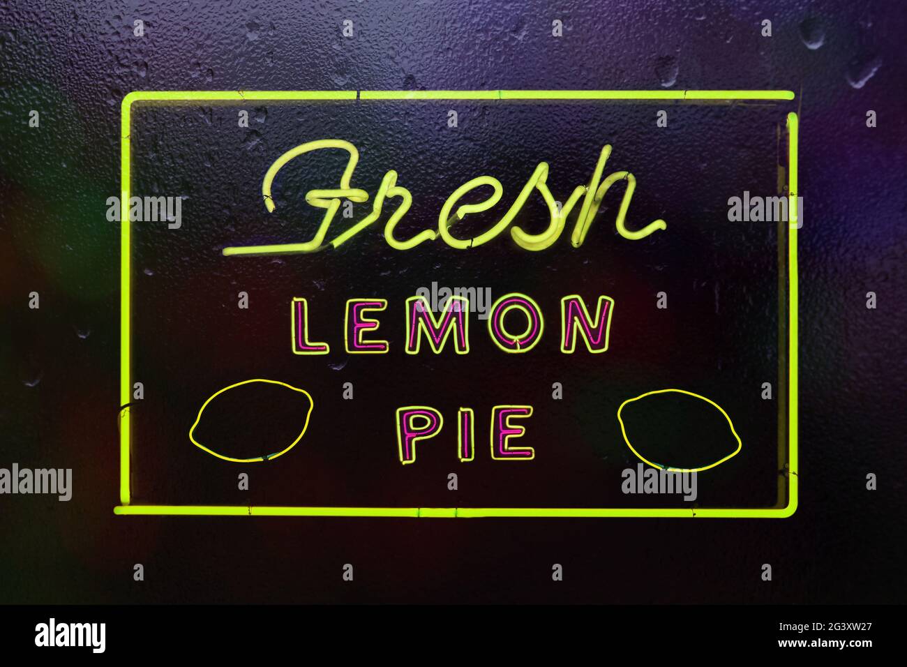Neon Fresh Lemon Pie Sign in Rainy Window Stock Photo - Alamy