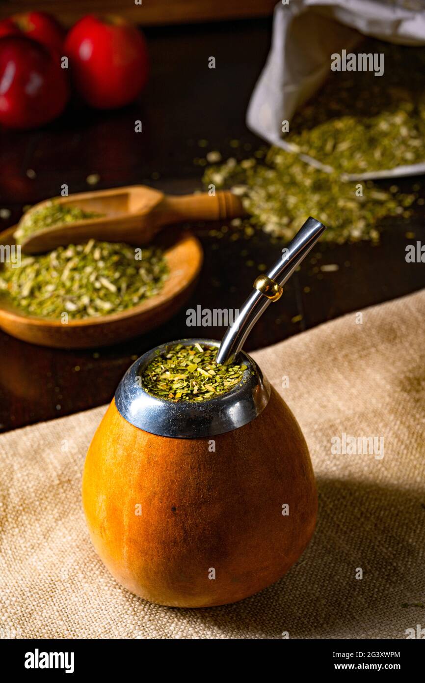 Prepare yerba mate with calabash and bombilla Stock Photo - Alamy