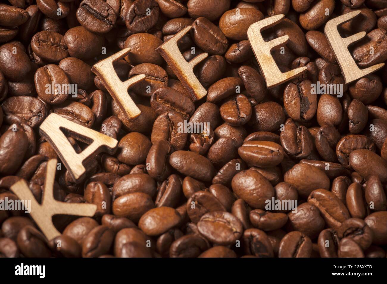Coffee beans with word Stock Photo - Alamy