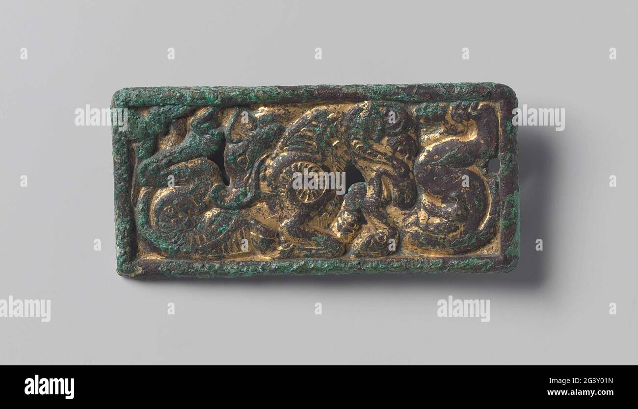 Ordos plaque with predators. Openwork slab with a representation of two ...