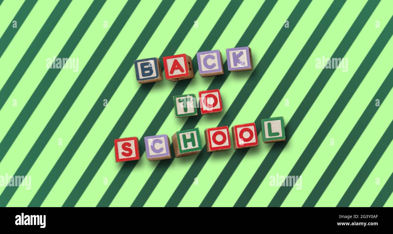 Composition of text back to school in coloured block letters over ...