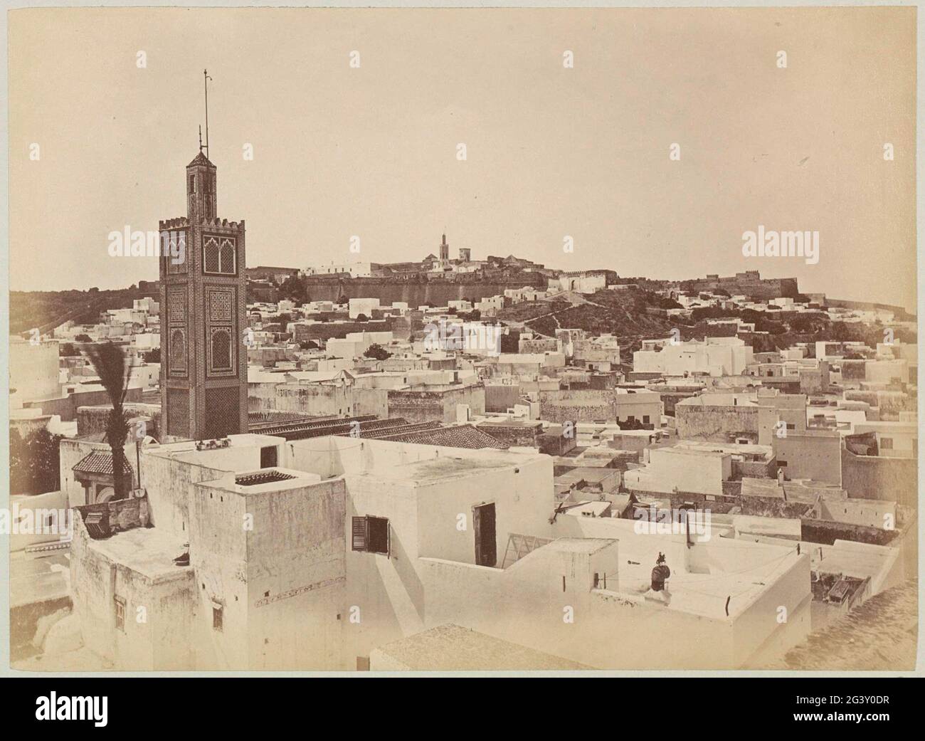 View of a Moroccan city with towers and roof terraces. Part of travel ...
