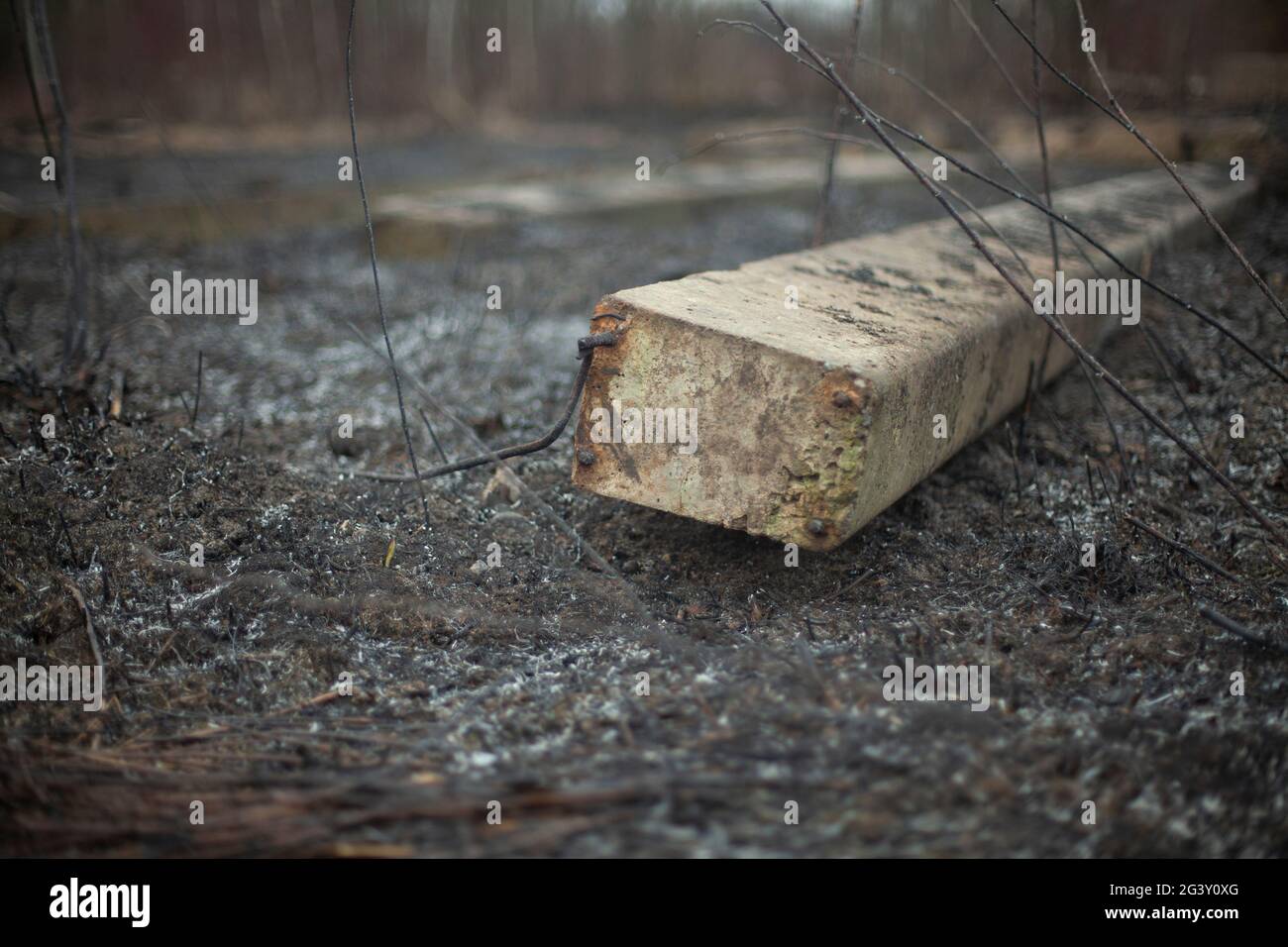 Concrete beams on the ground. Build materials after a fire. Remains on ...