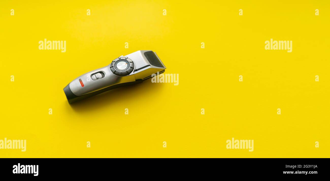the simple single abstract hair clipper isolated on the color ...