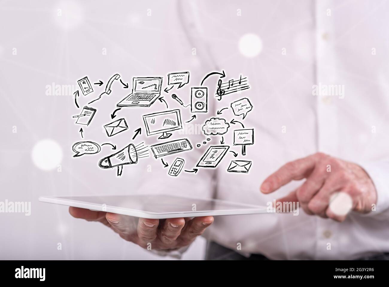 Communication concept above a tablet held by a man in background Stock ...