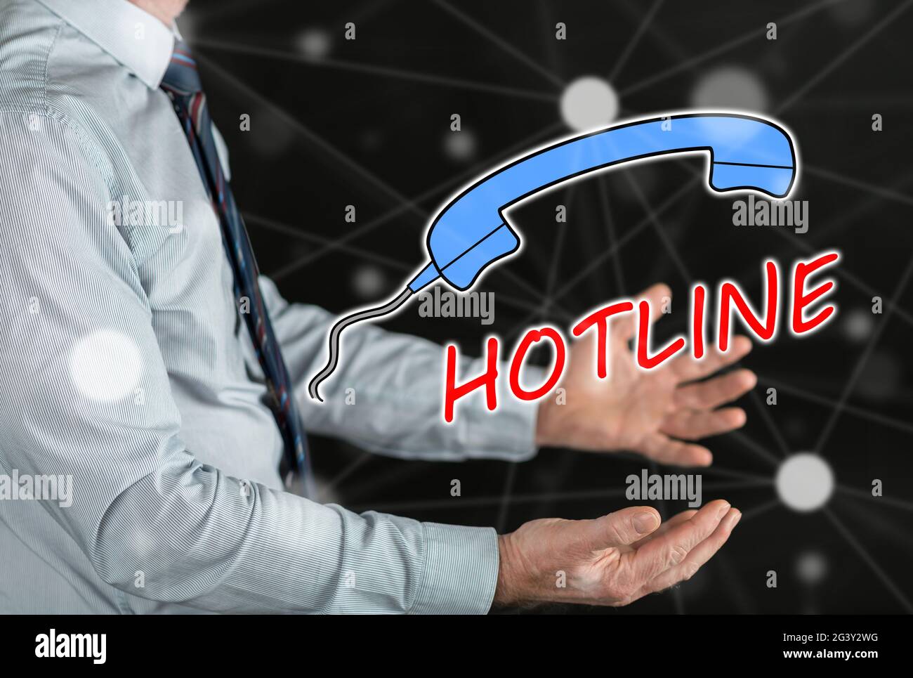 Hotline concept above the hands of a man Stock Photo - Alamy