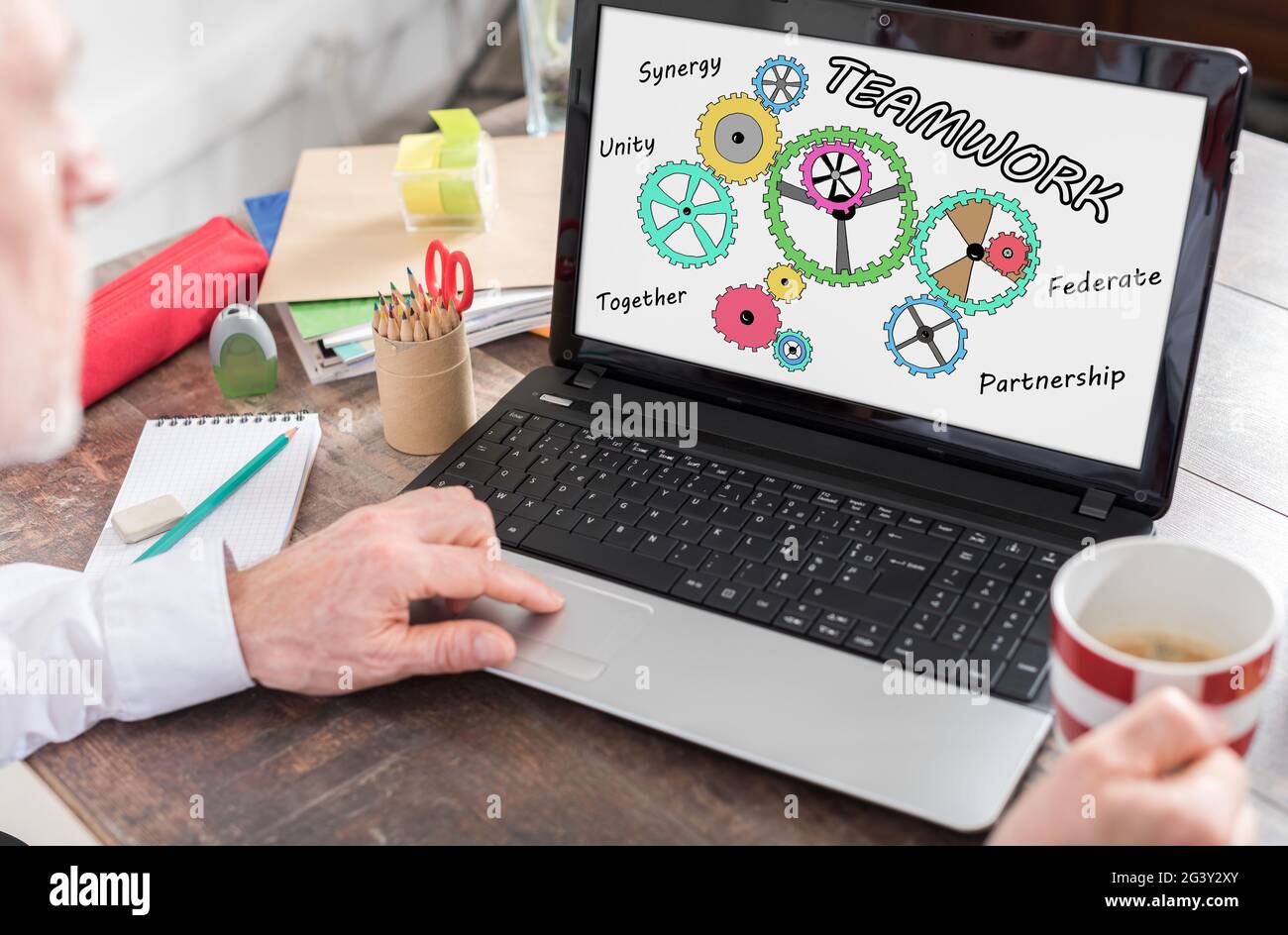Teamwork concept shown on a laptop screen Stock Photo - Alamy