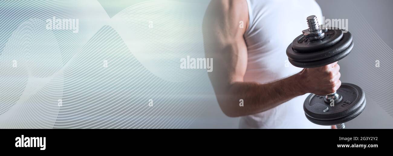 Athletic man working with heavy dumbbell. panoramic banner Stock Photo ...