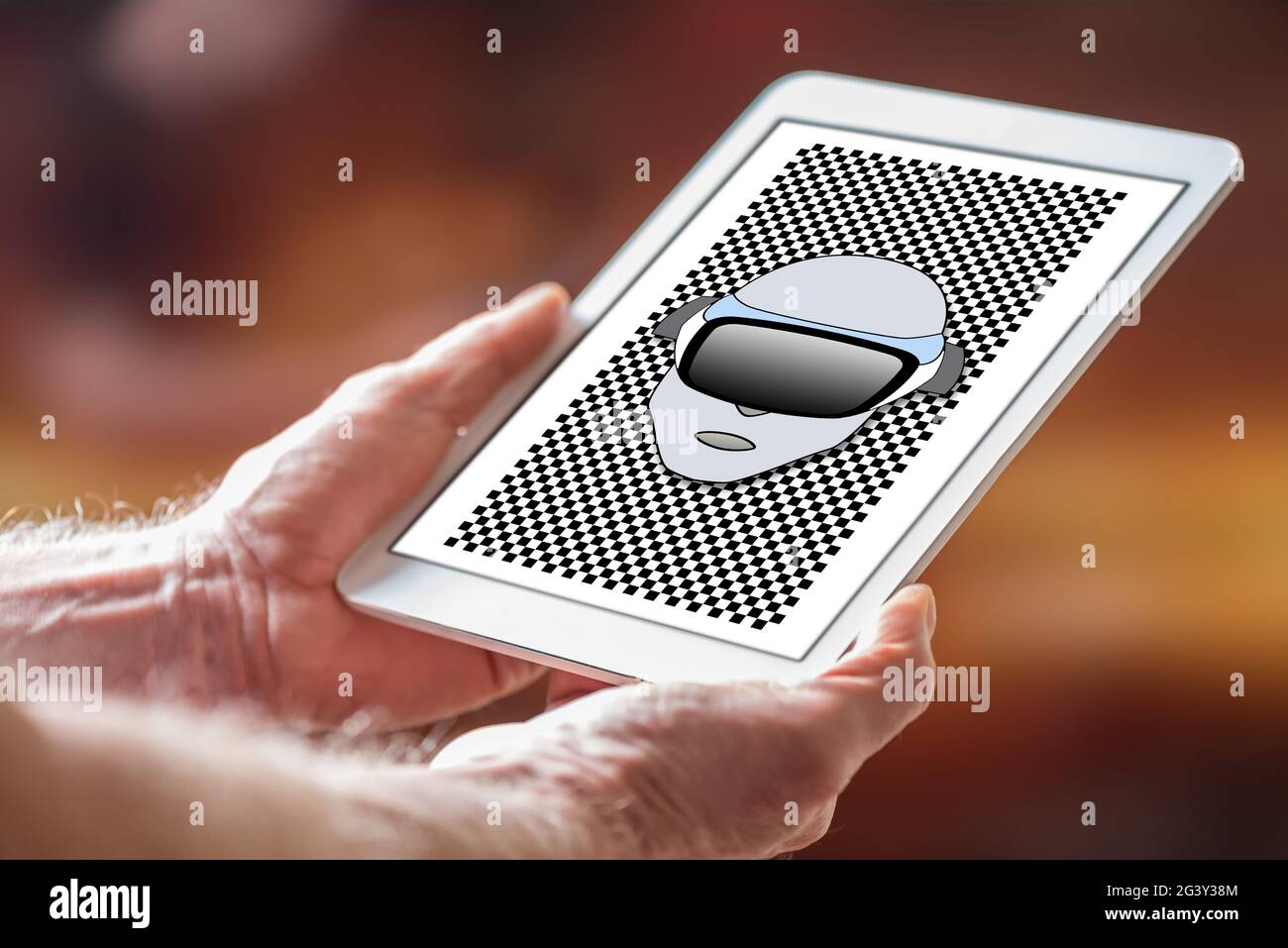 Man holding a tablet showing virtual reality concept Stock Photo - Alamy