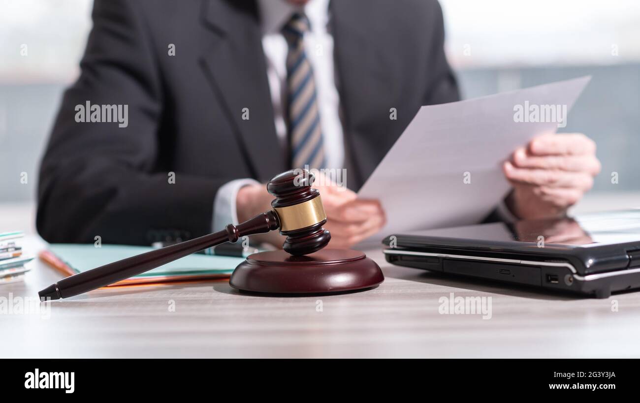 Lawyer working on legal document Stock Photo - Alamy