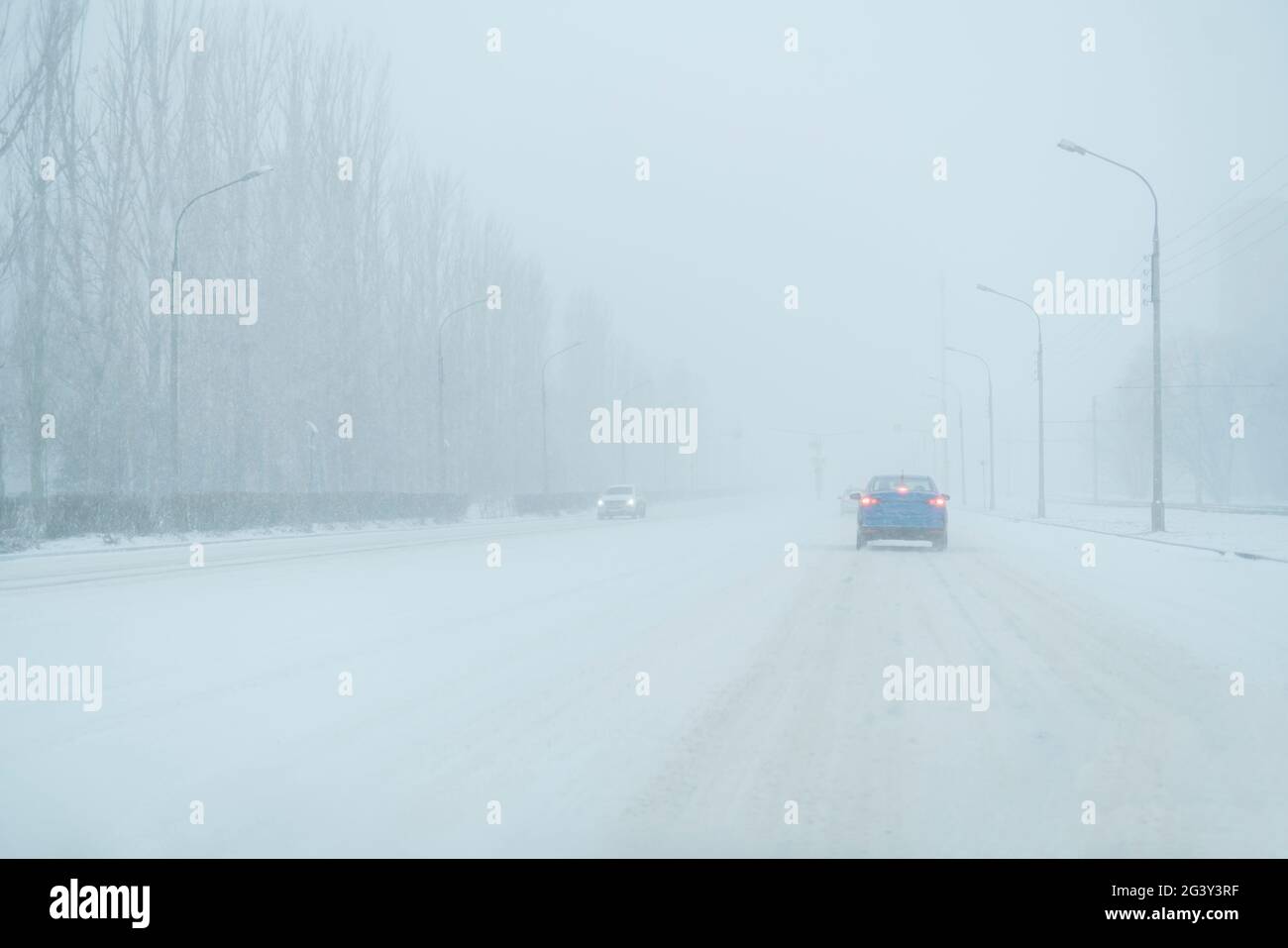 dangerous stormy weather in the city, collapse, snowfall on highway ...